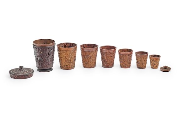 Bonhams : A set of seven carved wood nesting beakers reputedly ...