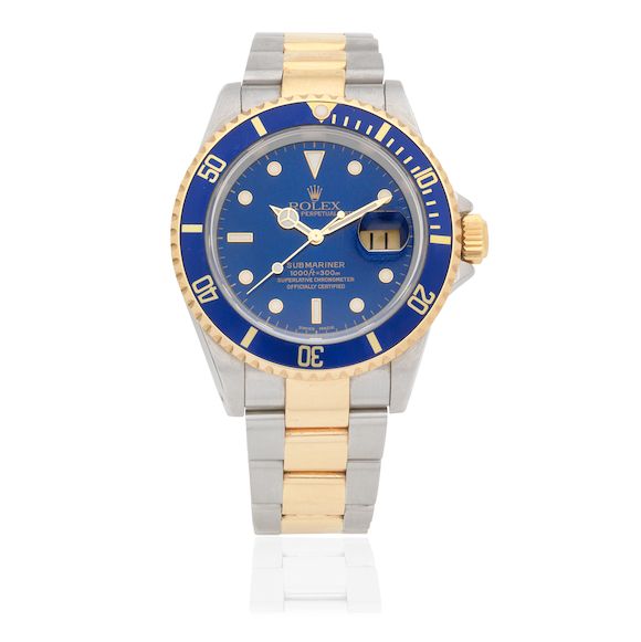 Bonhams : Rolex. A stainless steel and gold automatic calendar bracelet ...