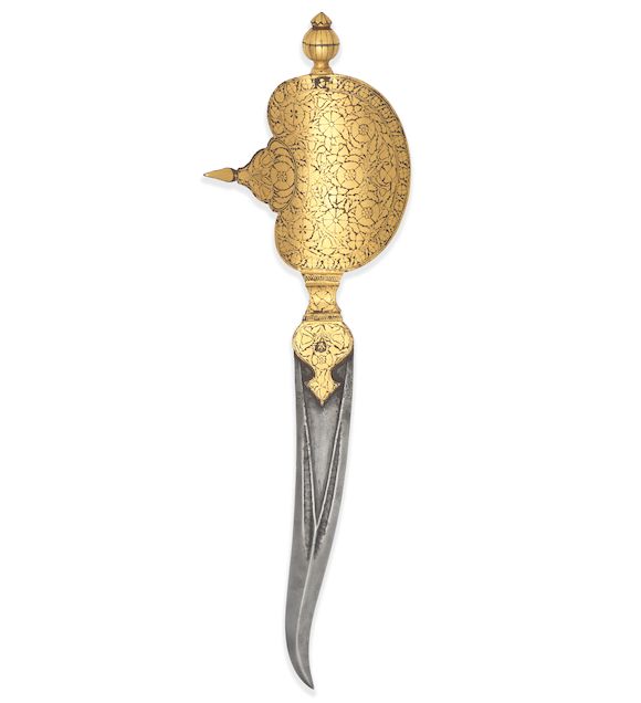 Bonhams : A gold koftgari-hilted steel dagger (bichwa) Deccan, 18th Century