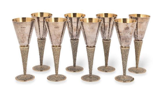 Bonhams : STUART DEVLIN A set of eight silver and silver-gilt goblets ...