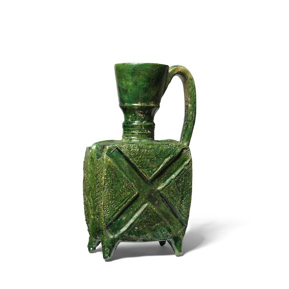 Bonhams : An Umayyad monochrome moulded pottery ewer Syria or ...