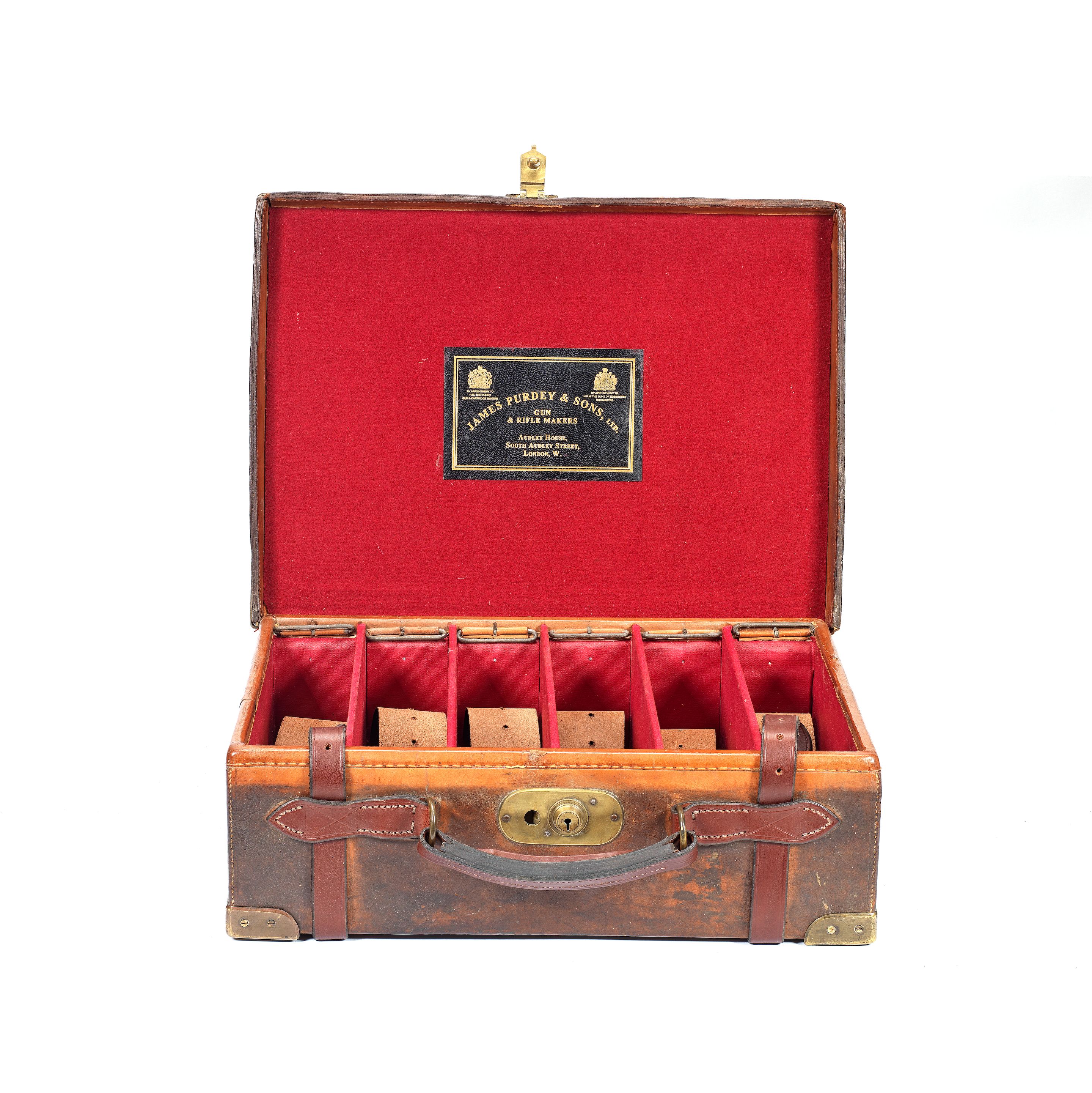 Bonhams : A brass-mounted leather cartridge magazine with replacement ...