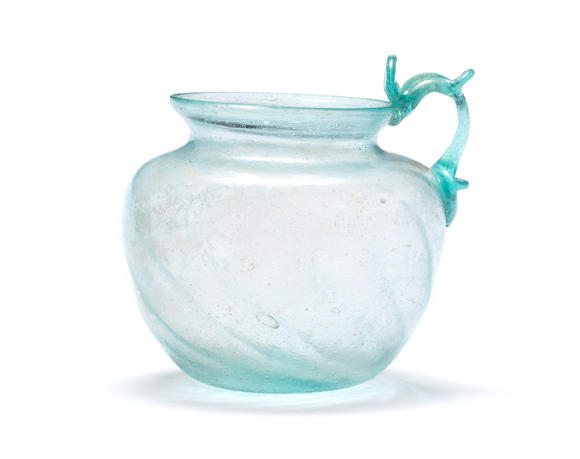Bonhams A Roman Blue Green Glass Handled Ribbed Cup