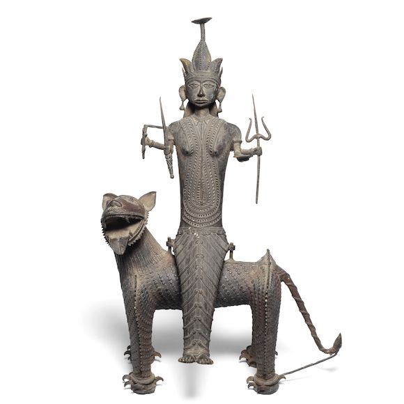 Bonhams : A large Bastar bronze figure of Durga riding a tiger ...