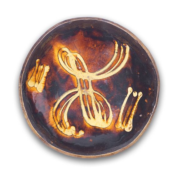 Bonhams : An English slipware dish, 18th century