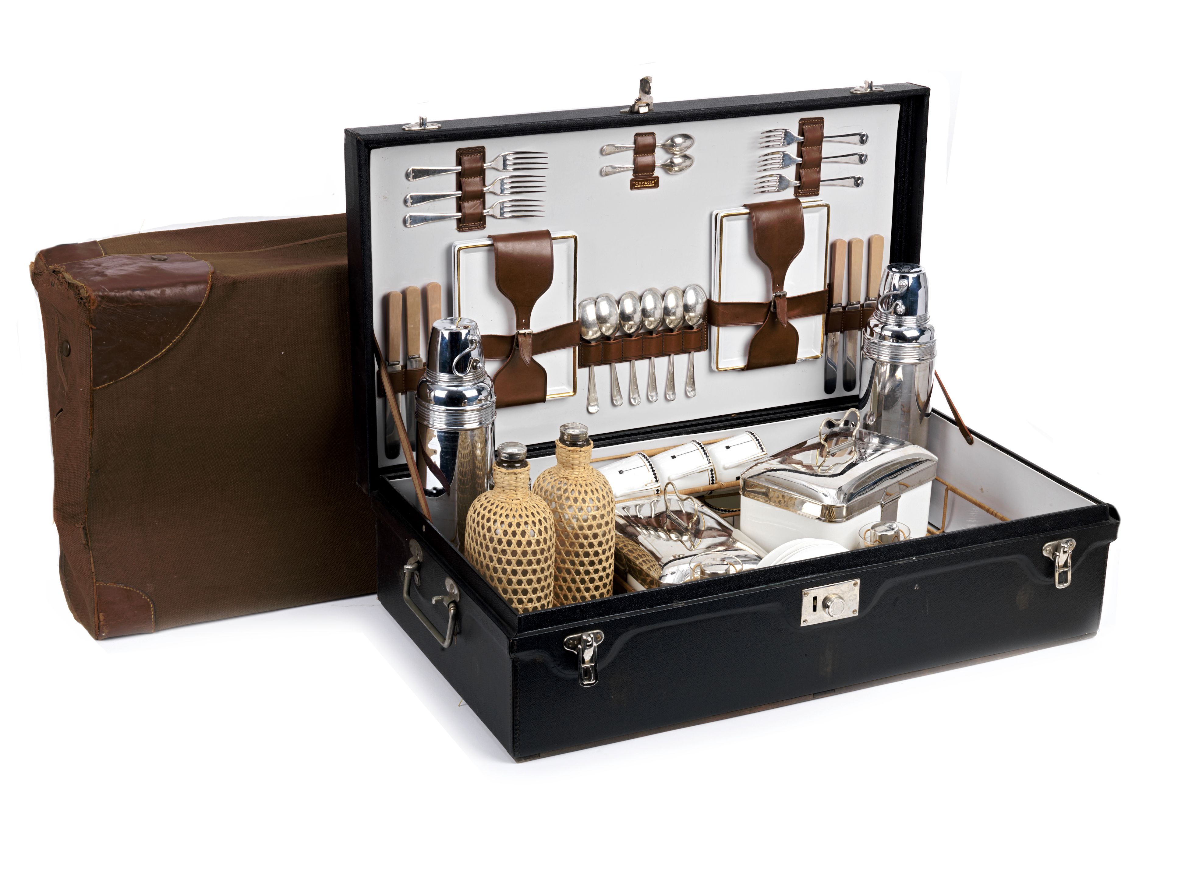 Bonhams Cars : A cased 'Coracle' picnic set for six persons, circa 1920,
