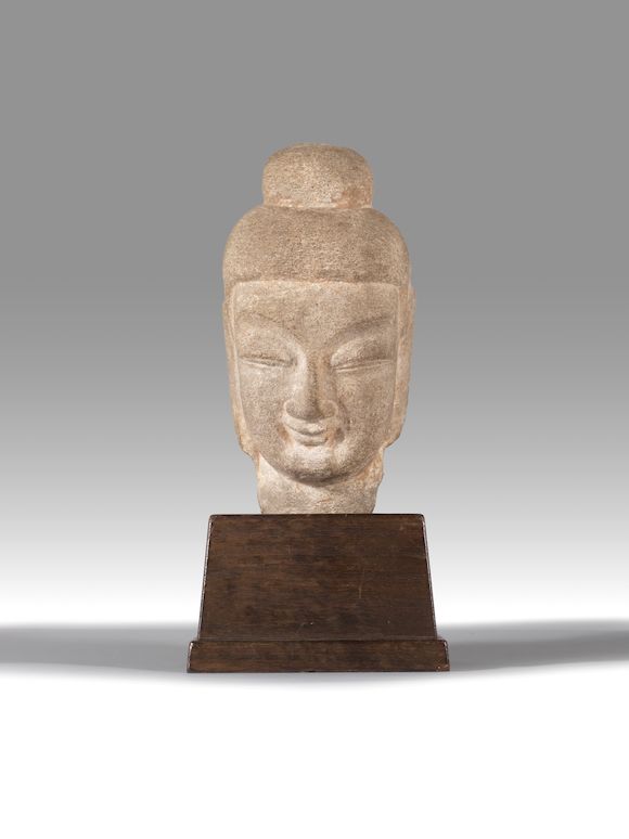 Bonhams : A SMALL SANDSTONE HEAD OF BUDDHA Northern Wei Dynasty or ...
