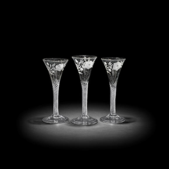 Bonhams A Set Of Three Engraved Airtwist Wine Glasses Of Possible