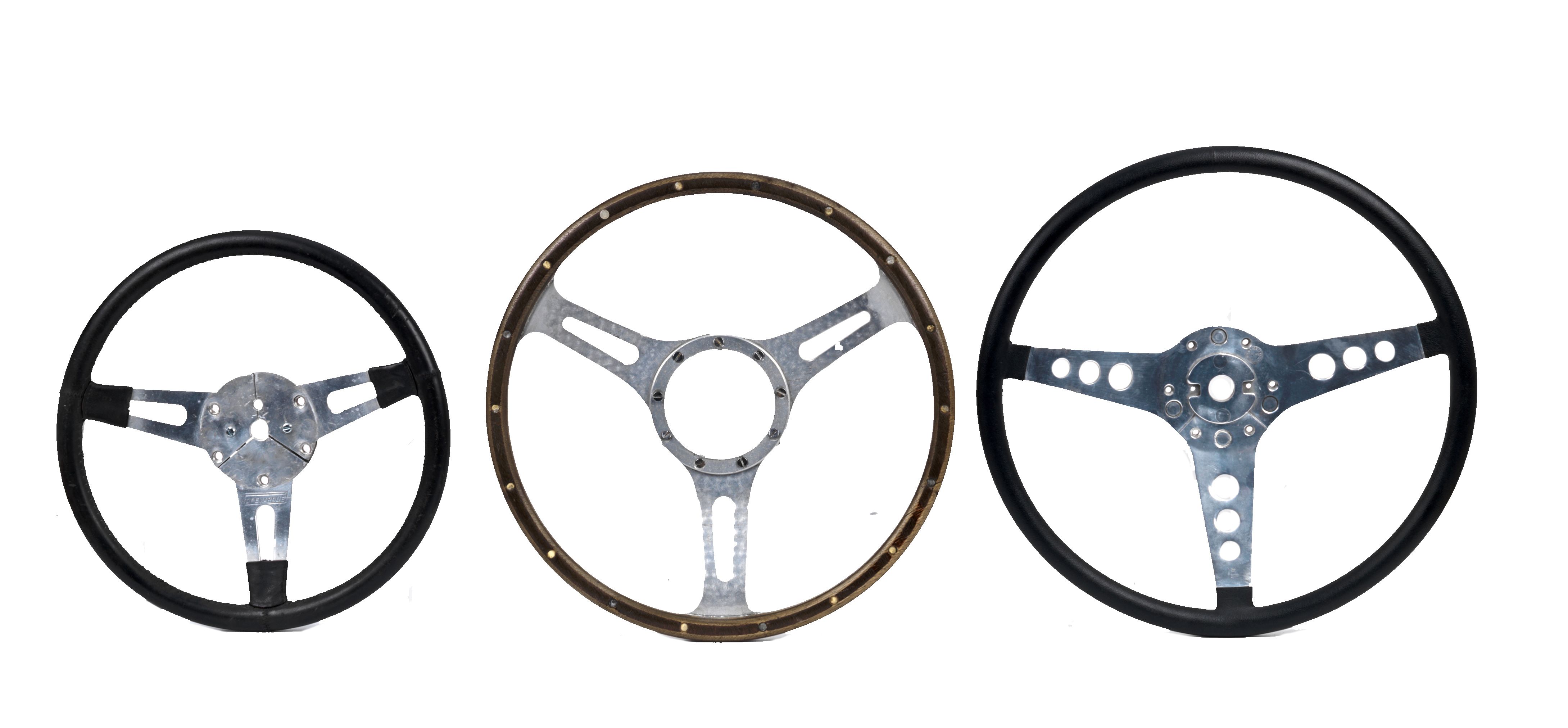 Bonhams Cars : Three post-War three-spoke racing steering wheels, ((3))