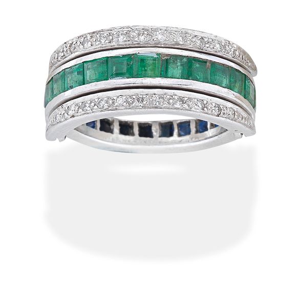 Bonhams : EMERALD, SAPPHIRE AND DIAMOND SWIVEL RING