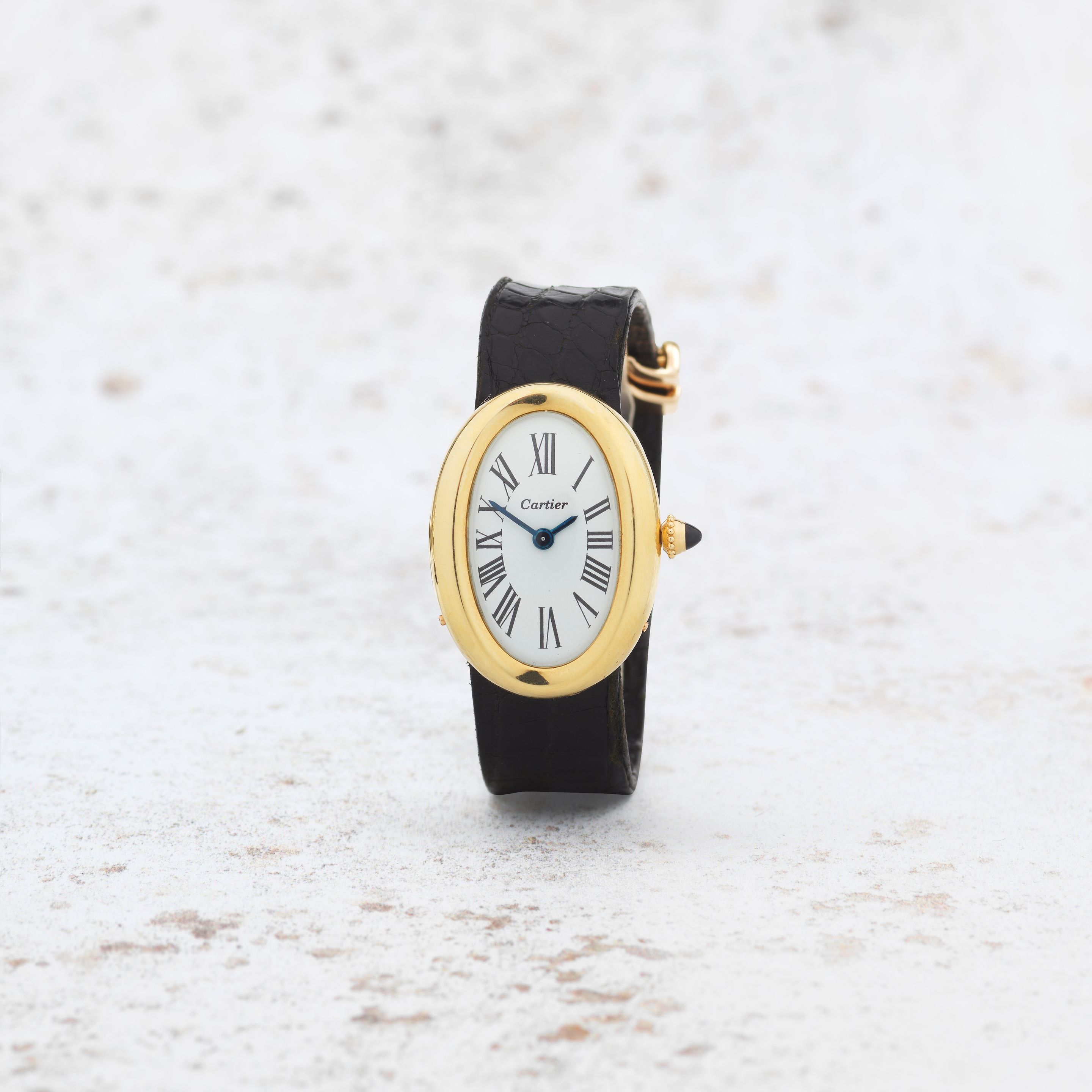 Cartier. A fine and rare lady's 18K gold manual wind wristwatch from ...