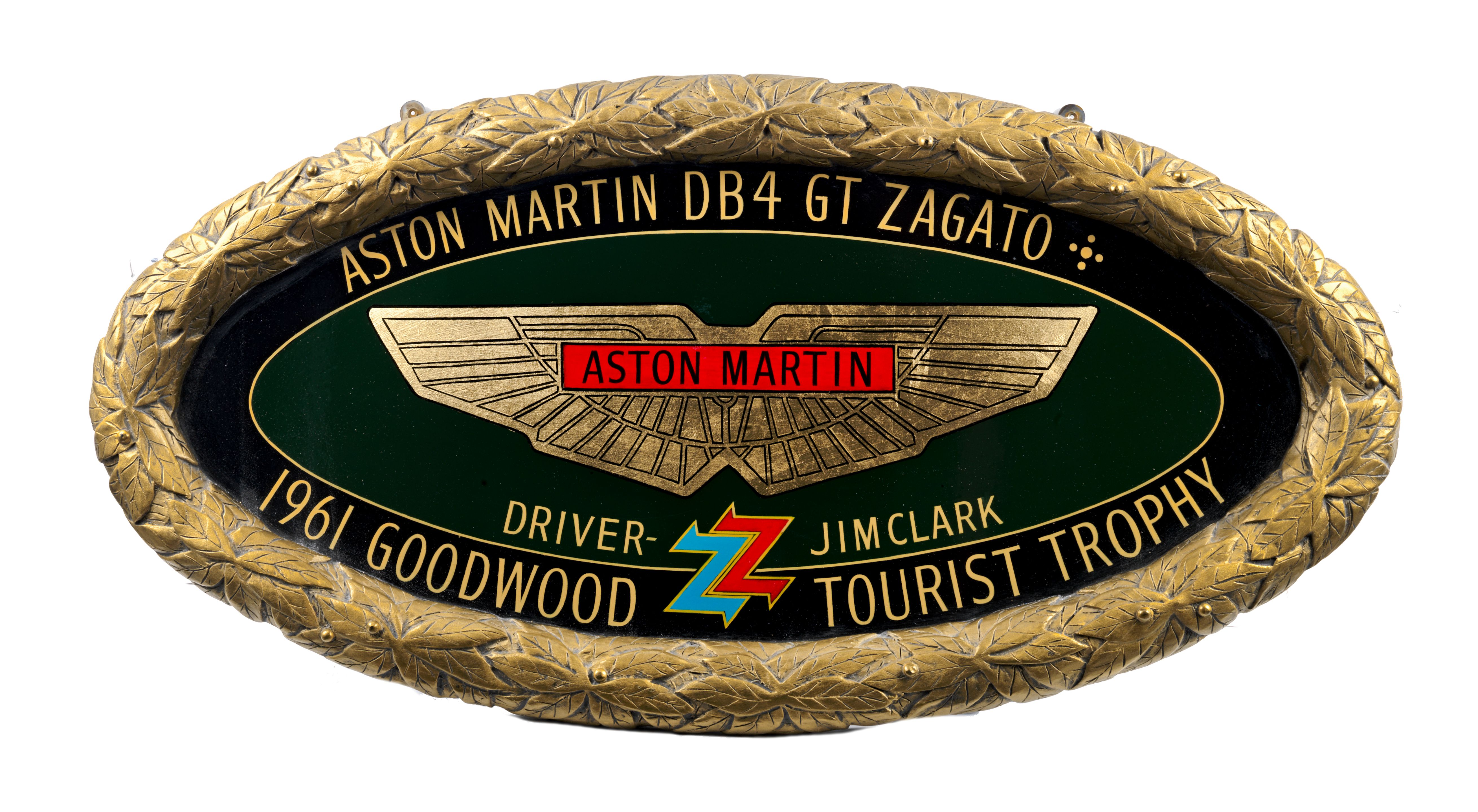 Bonhams Cars : Two Aston Martin themed garage display emblems, ((2))