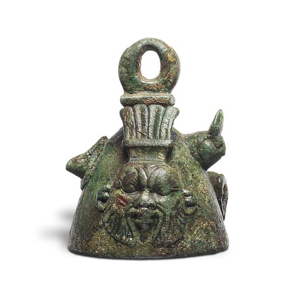 Bonhams : An Egyptian bronze Bes head bell