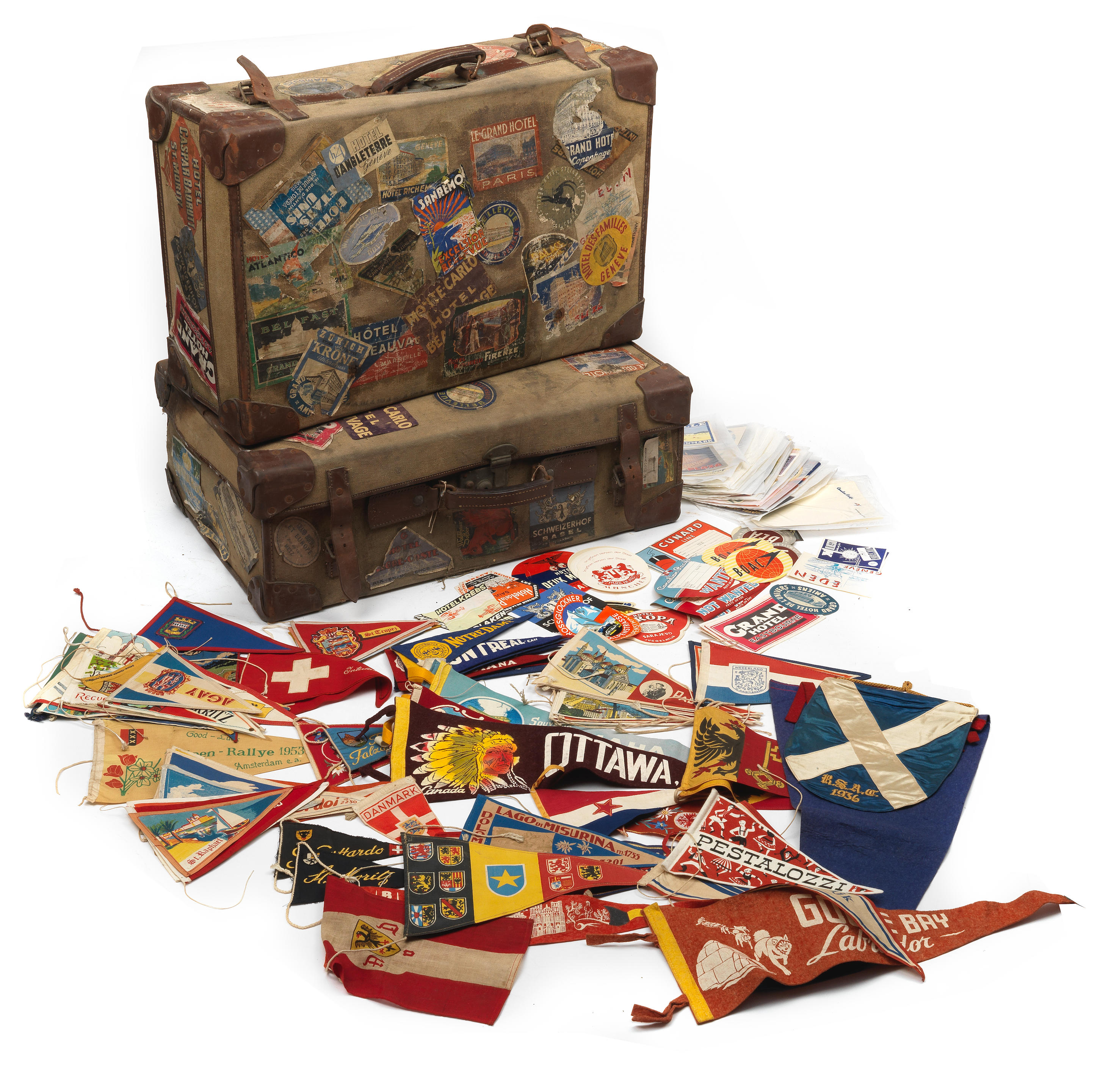 Bonhams Cars Two Suitcases And Assorted Travel Labels And Pennants