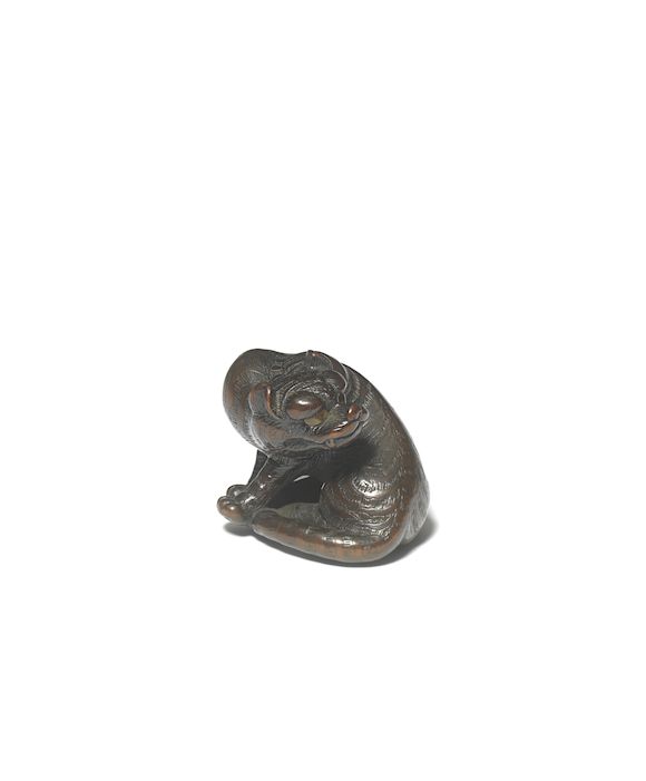 Bonhams : A WOOD NETSUKE OF A TIGER By Naito Toyomasa (1773-1856 ...
