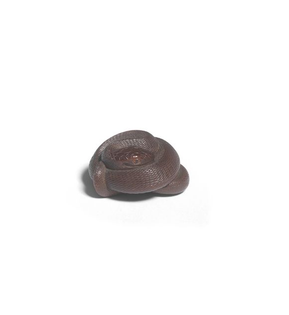 Bonhams : A WOOD NETSUKE OF A COILED SNAKE By Hogen Tadayoshi, Edo ...