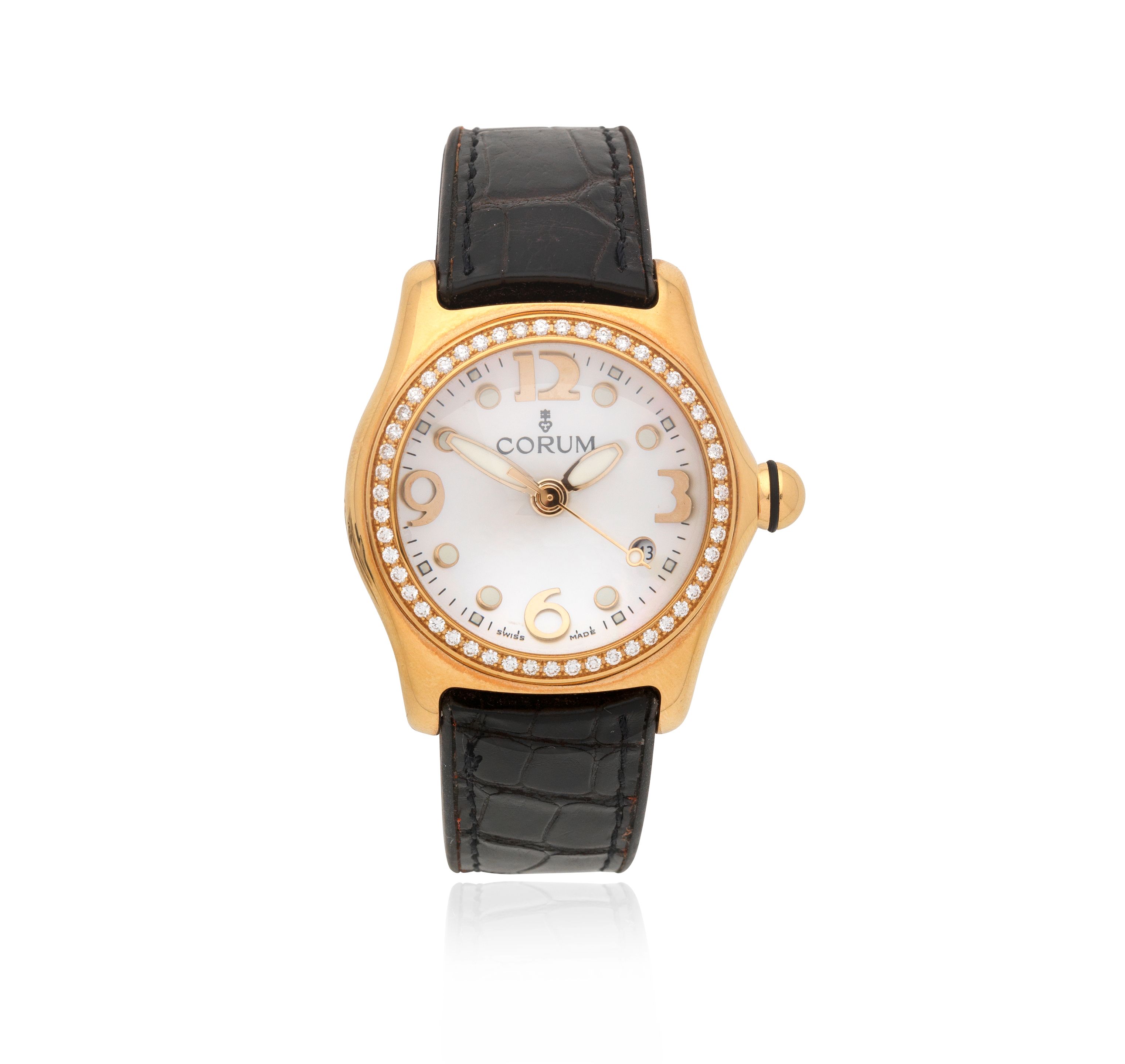 Bonhams : Corum. An 18K gold diamond set quartz calendar wristwatch ...