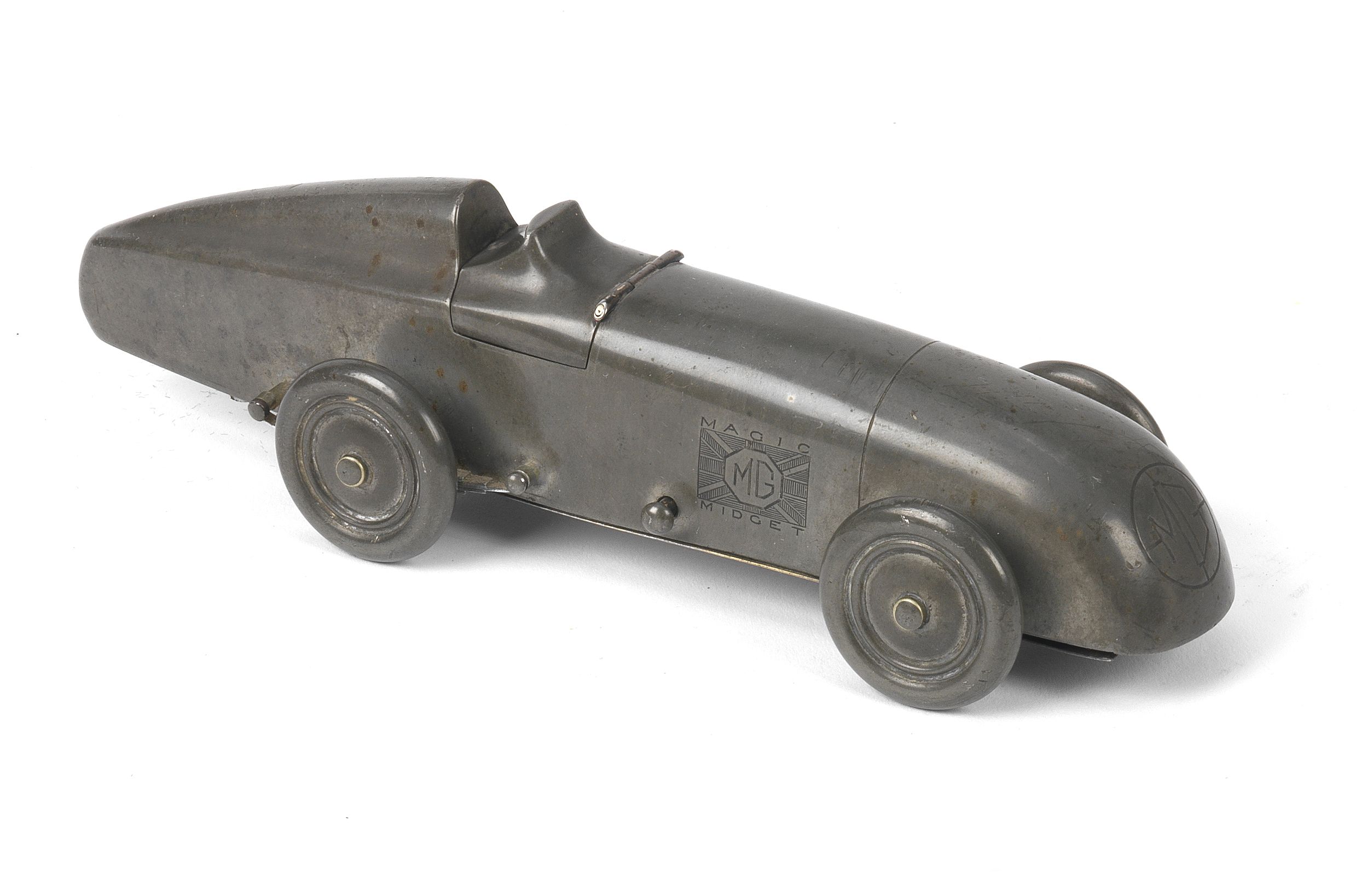 Bonhams Cars : A 1933 MG 'Magic Midget' pewter lighter and assorted MG ...