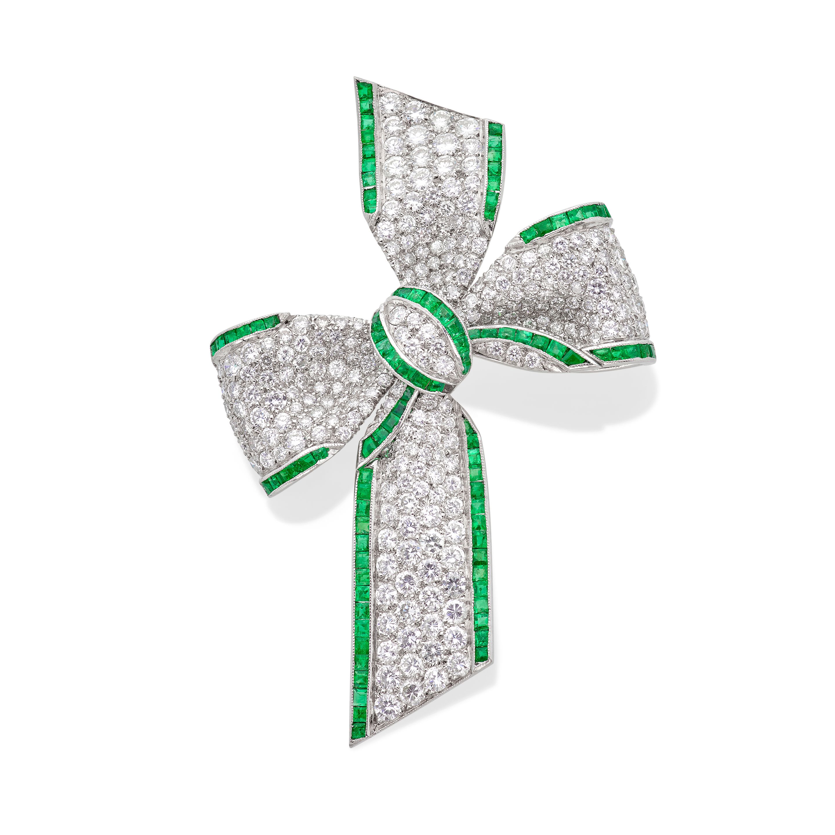 Bonhams : EMERALD AND DIAMOND BOW BROOCH, MID 20TH CENTURY