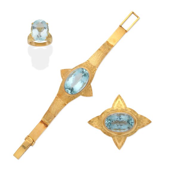 Bonhams : SIMON BENNEY AQUAMARINE BRACELET, BROOCH AND RING SUITE, (3)