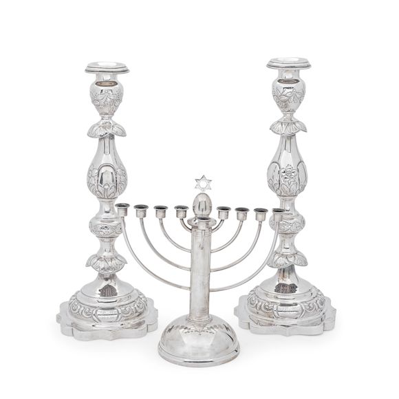 Bonhams : A pair of silver Sabbath candlesticks and a silver menorah ...