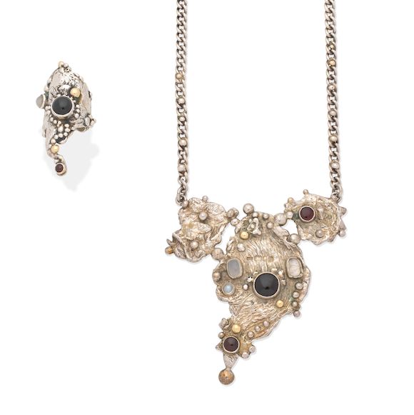 Bonhams : MICHAEL ALLEN BOLTON: SILVER AND GEM-SET RING AND PENDANT ...