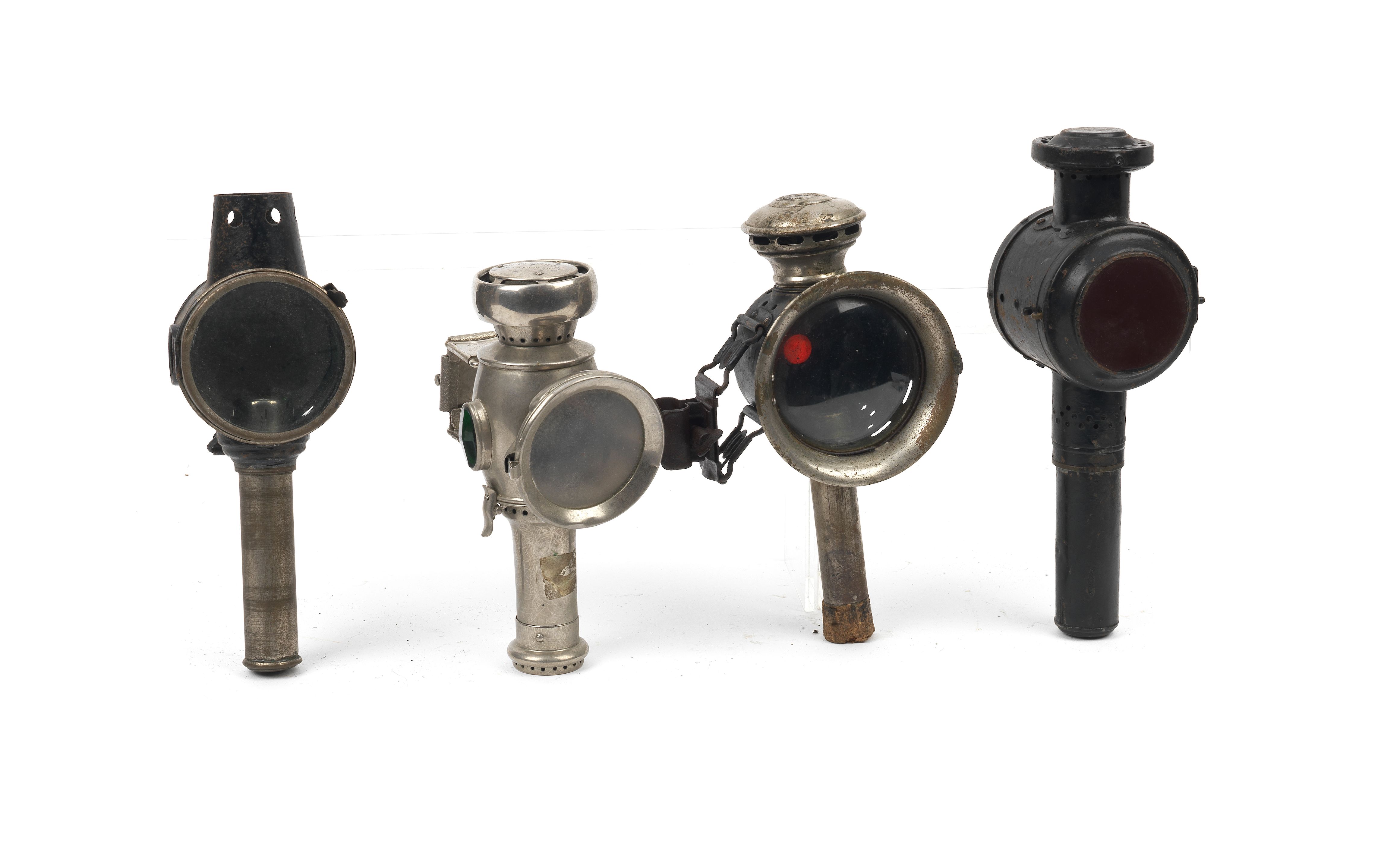 Bonhams Cars : Four candle-powered early cycle lamps, ((4))