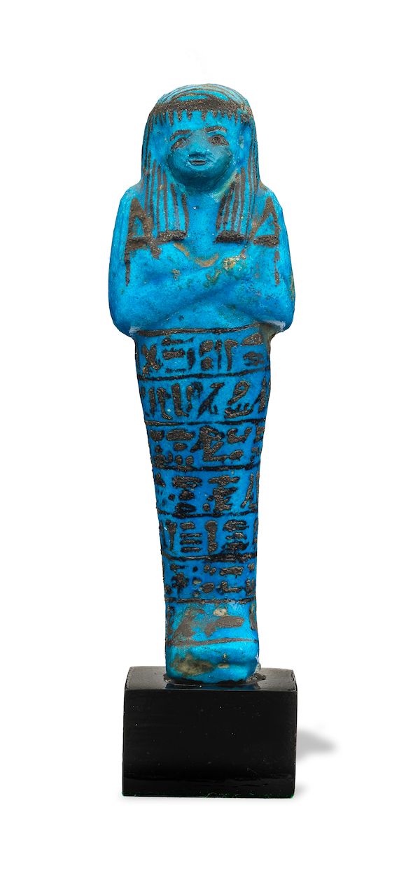 Bonhams : An Egyptian bright blue glazed faience shabti for the High ...