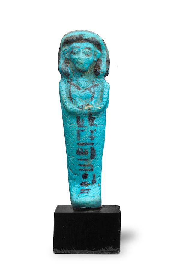 Bonhams : An Egyptian bright blue glazed faience shabti for the god's ...