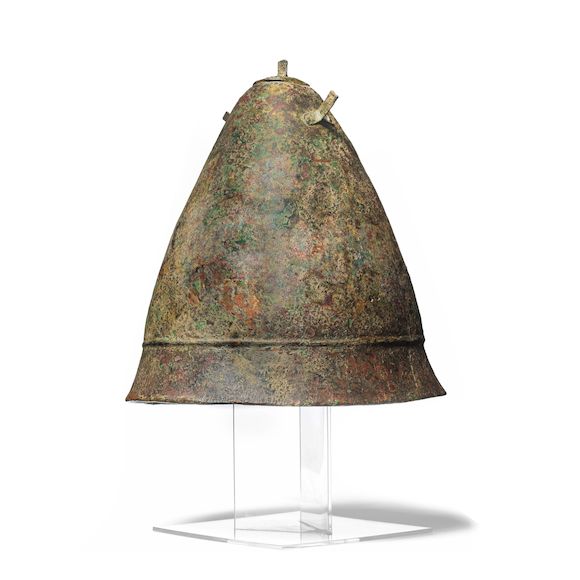 Bonhams : A Greek bronze pilos helmet