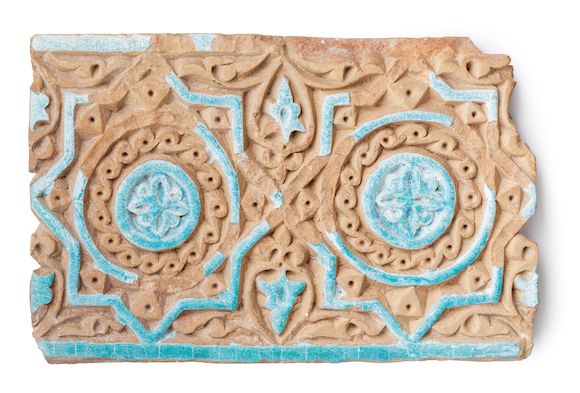 Bonhams : A Timurid moulded pottery tile Central Asia, 14th Century
