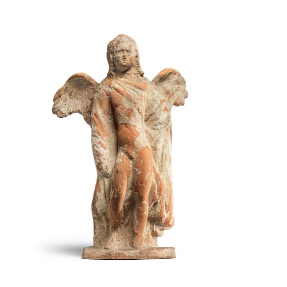 Bonhams : A Greek terracotta standing Eros