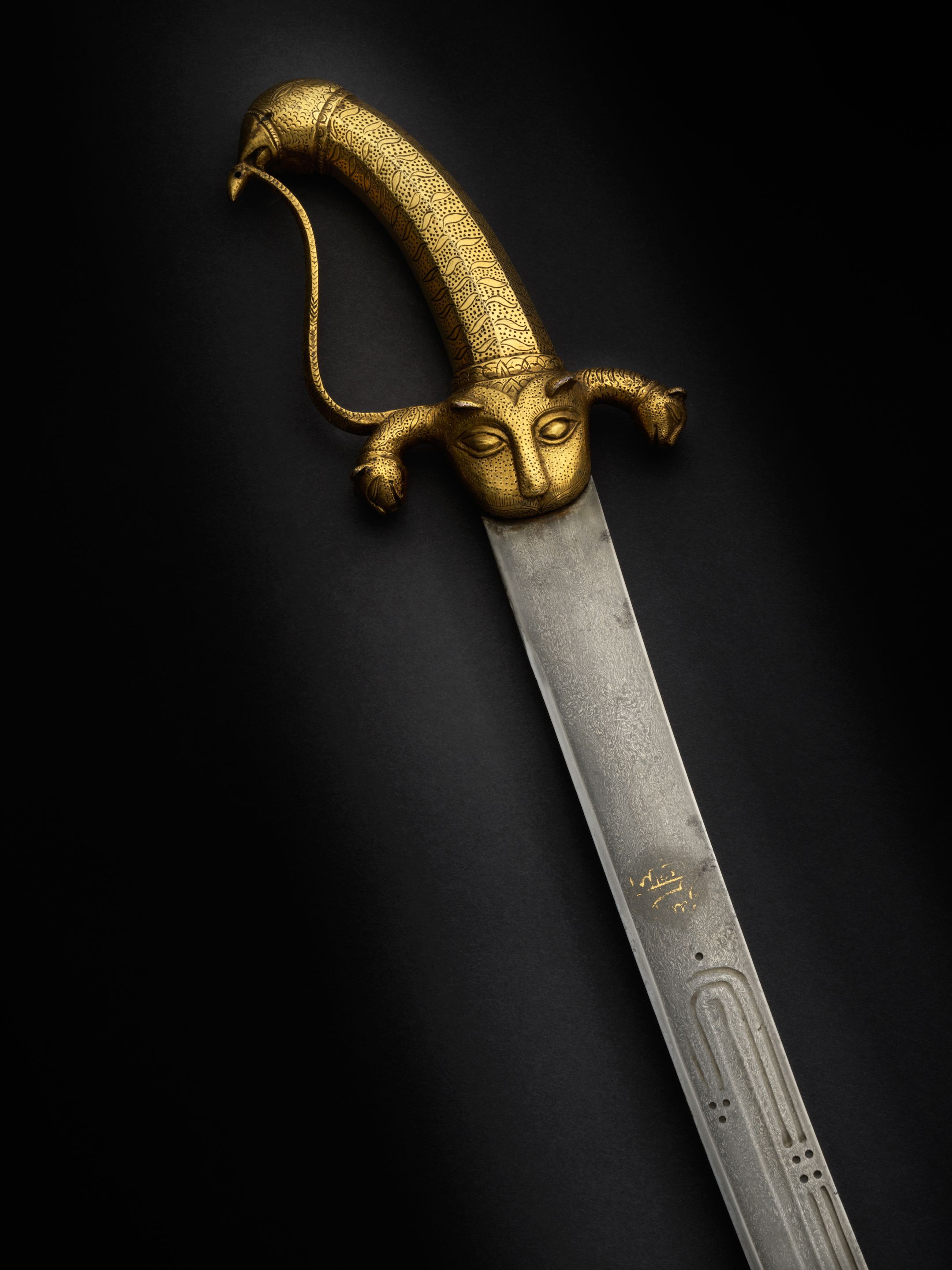 A gilt-copper hilted steel sword from the armoury of Tipu Sultan ...