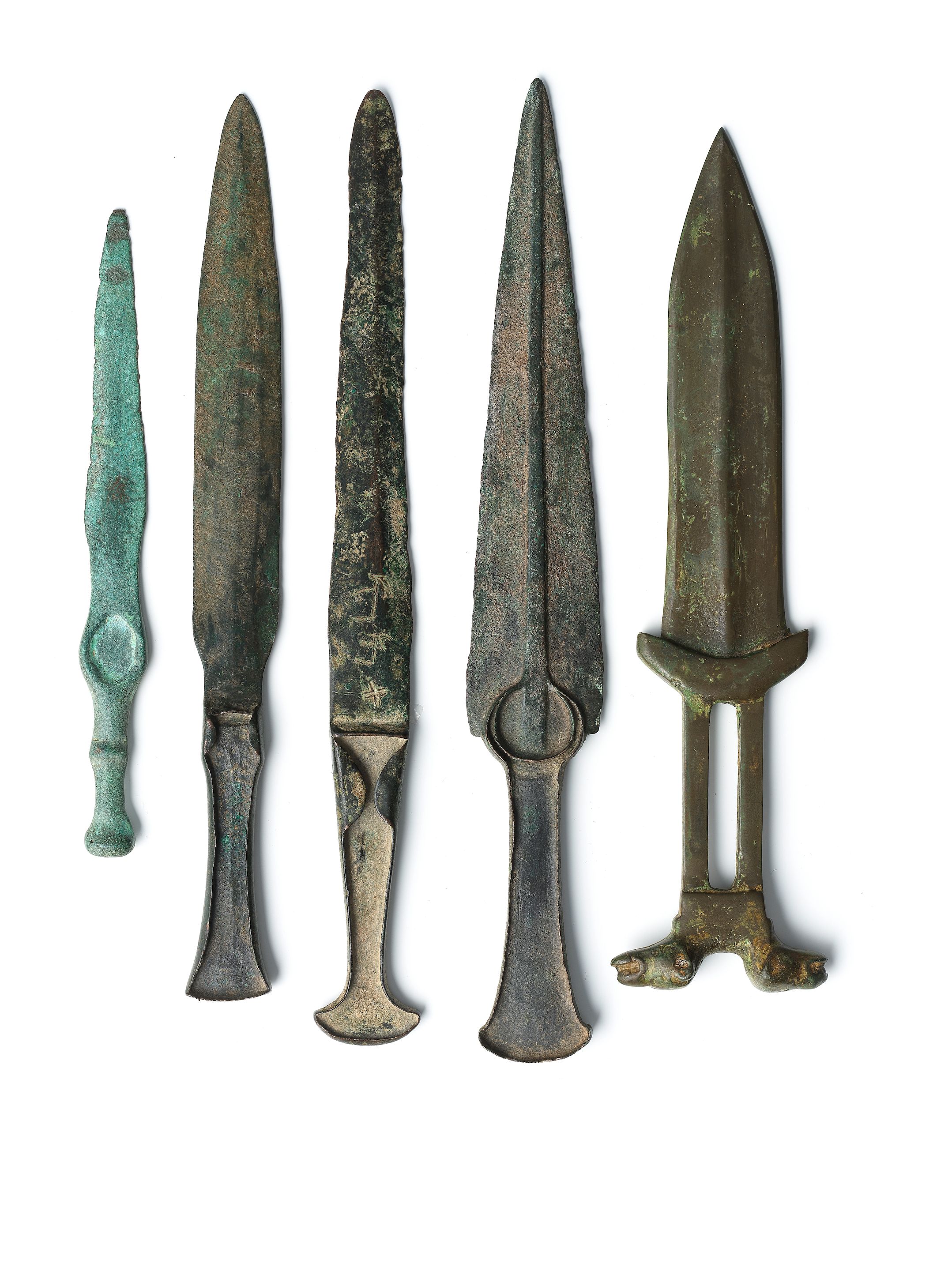 Bonhams : Three Luristan bronze daggers and two Central Asian bronze ...