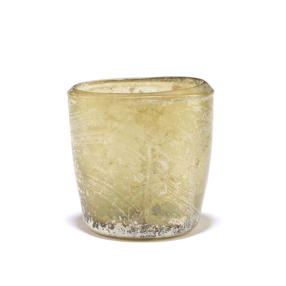 Bonhams : A Gallo-Roman yellow-green glass oval beaker