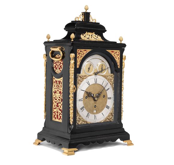 Bonhams : An ebonised musical table clock with six tunes playing on 26 ...