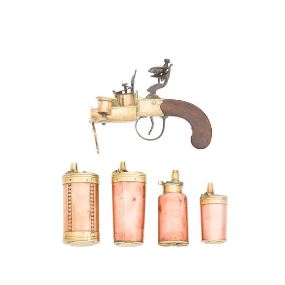 Bonhams : A Flintlock Tinderlighter, And Four Brass-Mounted Three-Way ...