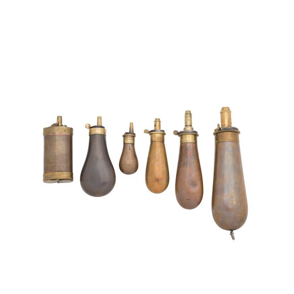 Bonhams : Six Brass-Mounted Powder-Flasks For Percussion Pistols