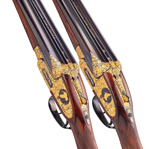 Bonhams : A very fine pair of K. C. Hunt engraved and gold-decorated 12 ...