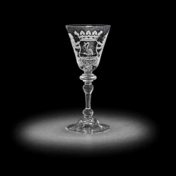 Bonhams A Dutch Engraved Armorial Light Baluster Wine Glass Circa