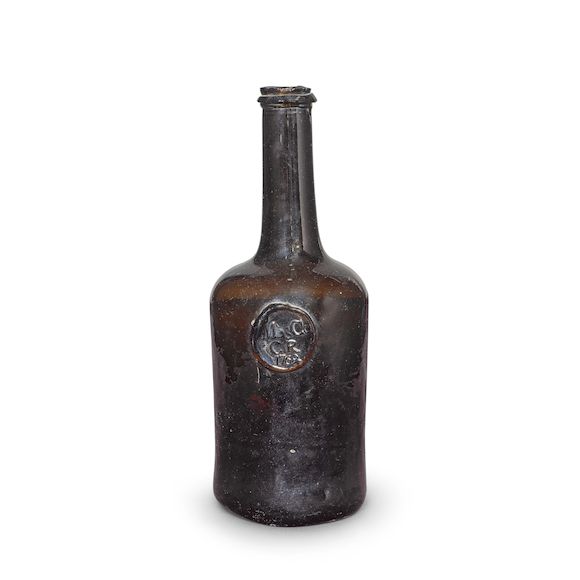 Bonhams : A sealed 'Cylinder' wine bottle, dated 1769