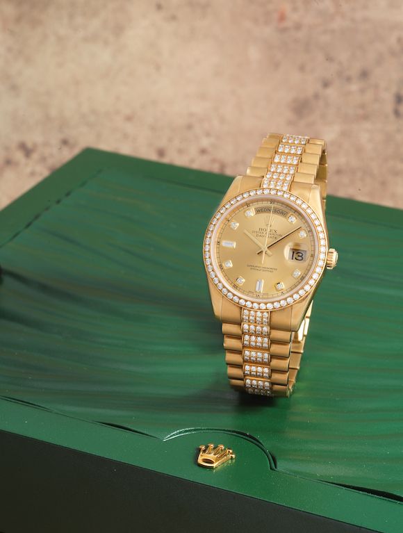 Bonhams : Rolex. A fine 18K gold diamond set automatic calendar ...