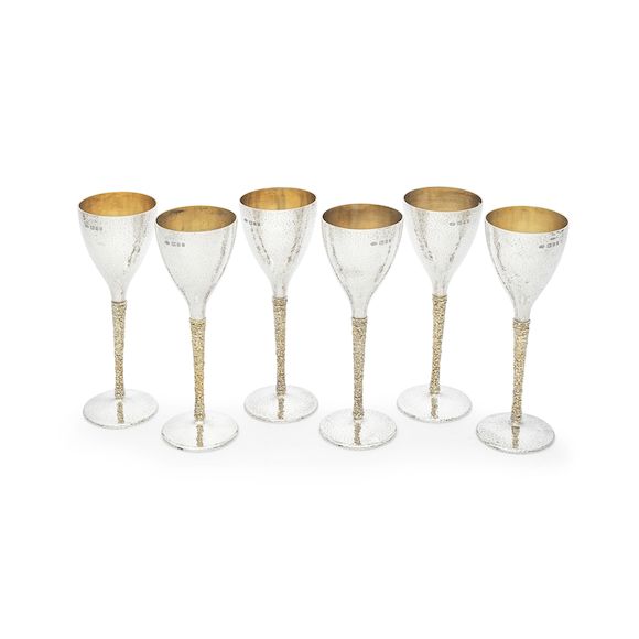 Bonhams : STUART DEVLIN: a set of six silver and silver-gilt goblets ...