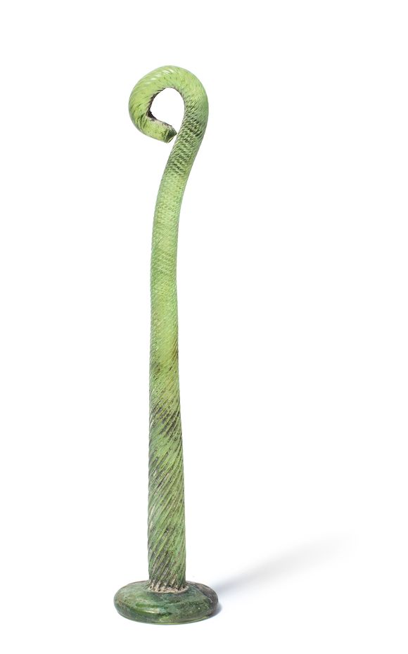 Bonhams : A Roman twisted green glass rod