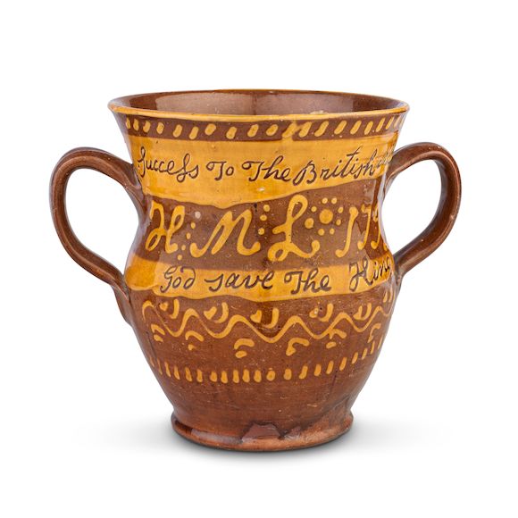 Bonhams : An English slipware pot, dated 1799