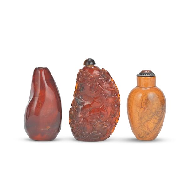 Bonhams : THREE AMBER SNUFF BOTTLES 18th/19th century (5)