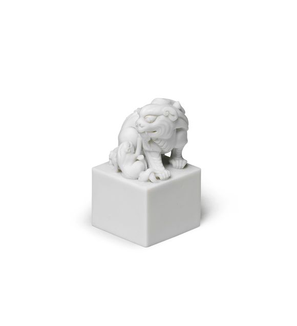 Bonhams : A BLANC-DE-CHINE 'MYTHICAL BEAST AND CUB' SQUARE SEAL Xuande ...
