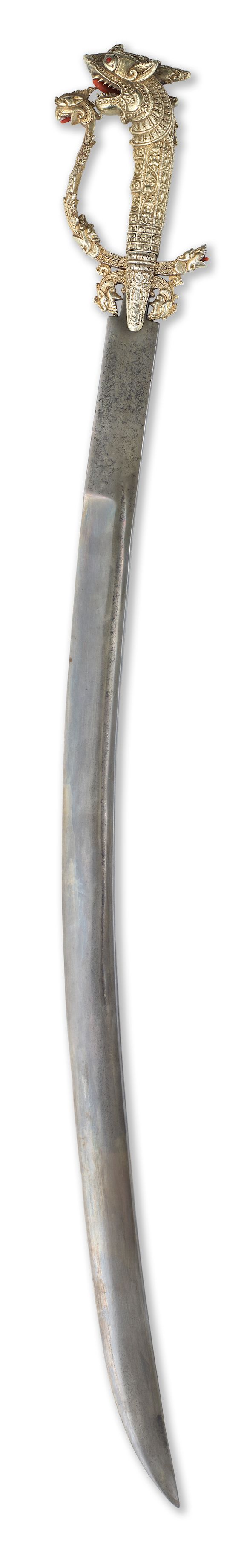 Bonhams : A Singhalese coral-mounted kastane Sri Lanka, 19th Century