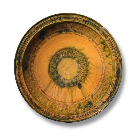 Bonhams : A large Amol pottery dish Persia, 12th Century