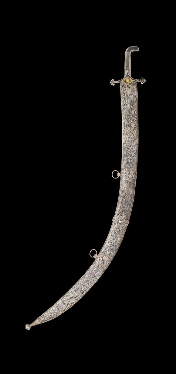 Bonhams : A niello silver-hilted finely watered-steel sword (kilij ...